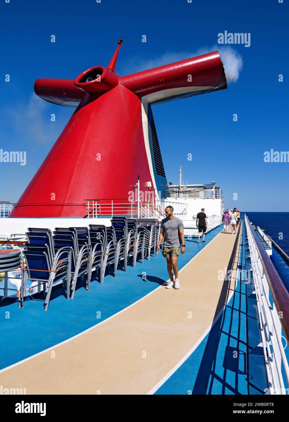 South Pacific Cruise / Cruise ship passengers walking on the jogging ...