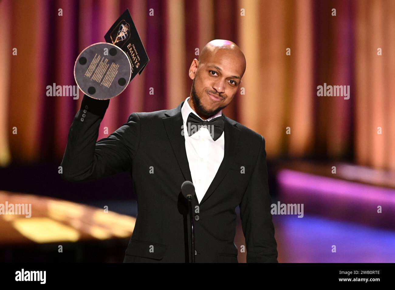 Andrew Law accepts the Emmy for outstanding lighting design / lighting ...