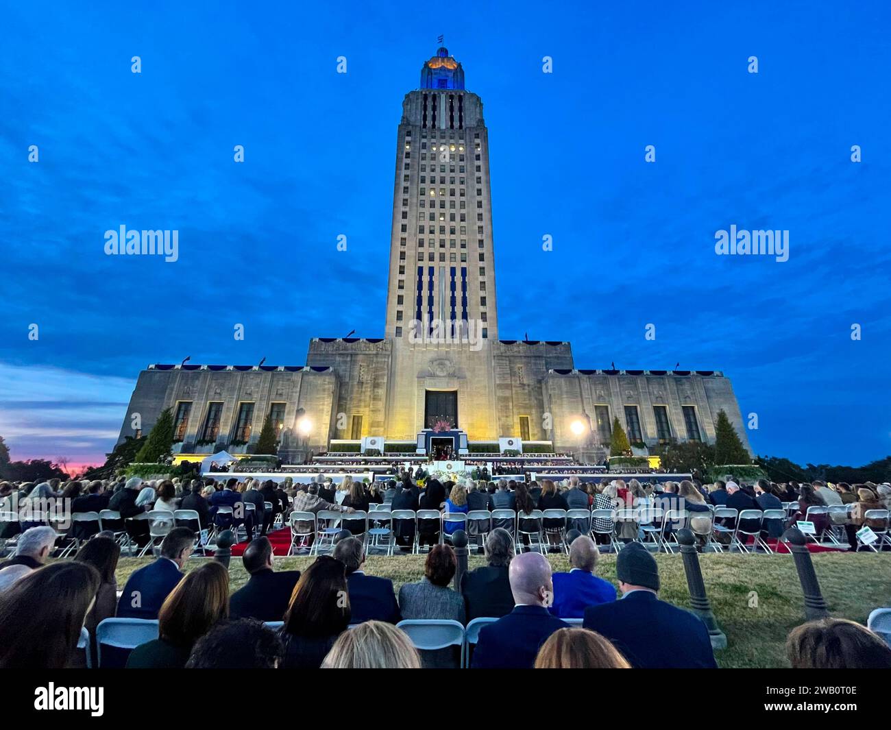 People listen to Louisiana Republican Gov. Jeff Landry speak during his ...