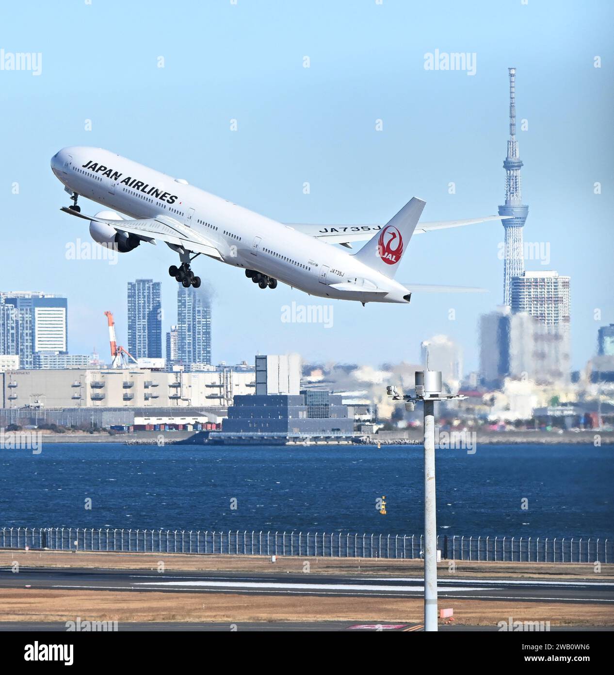 Runway C at Haneda Airport reopens in Tokyo on January 8, 2024. A Japan Airlines Flight 516 ...