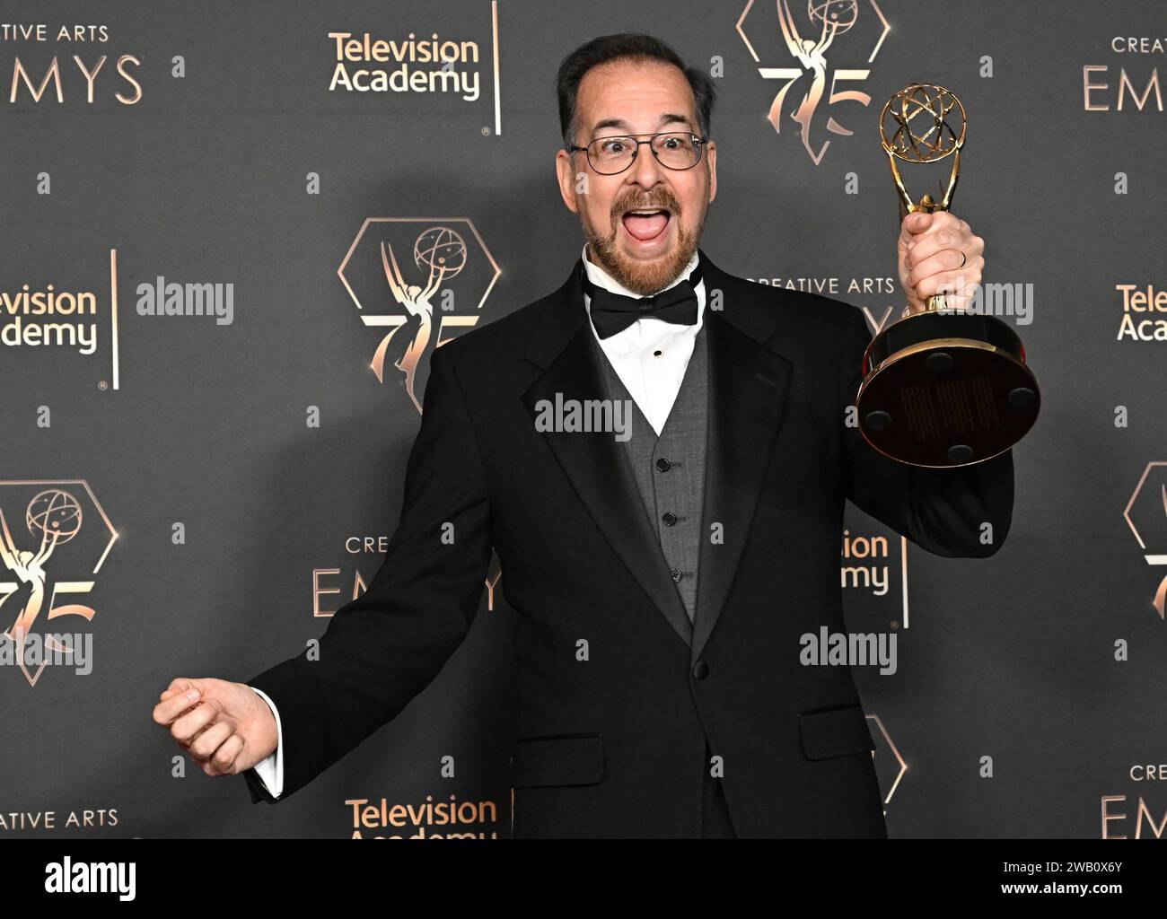 Nik Ranieri with their Emmy for outstanding individual achievement in ...