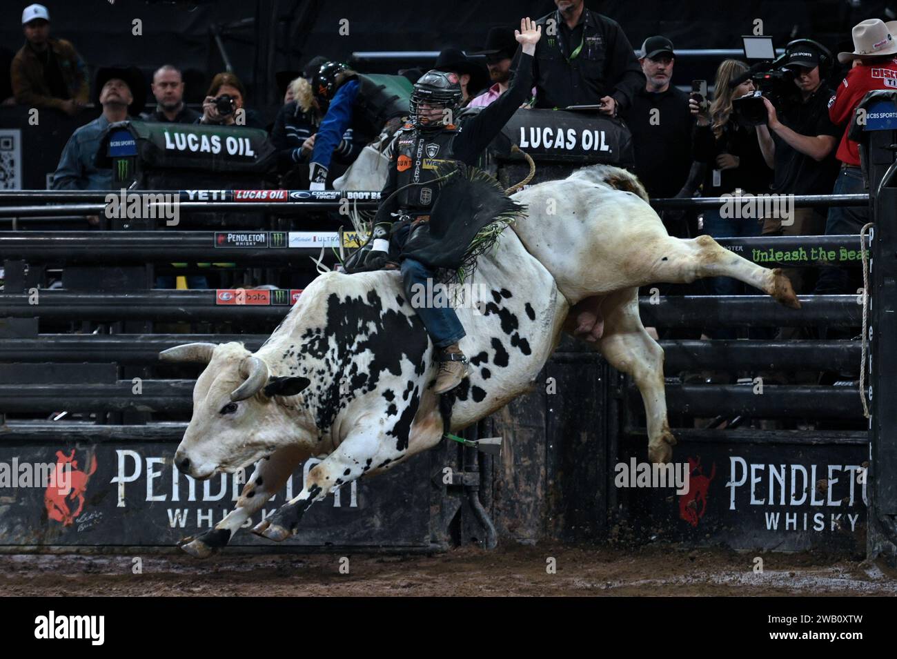 Professional bull rider Austin Richardson rides a bull named 'The ...