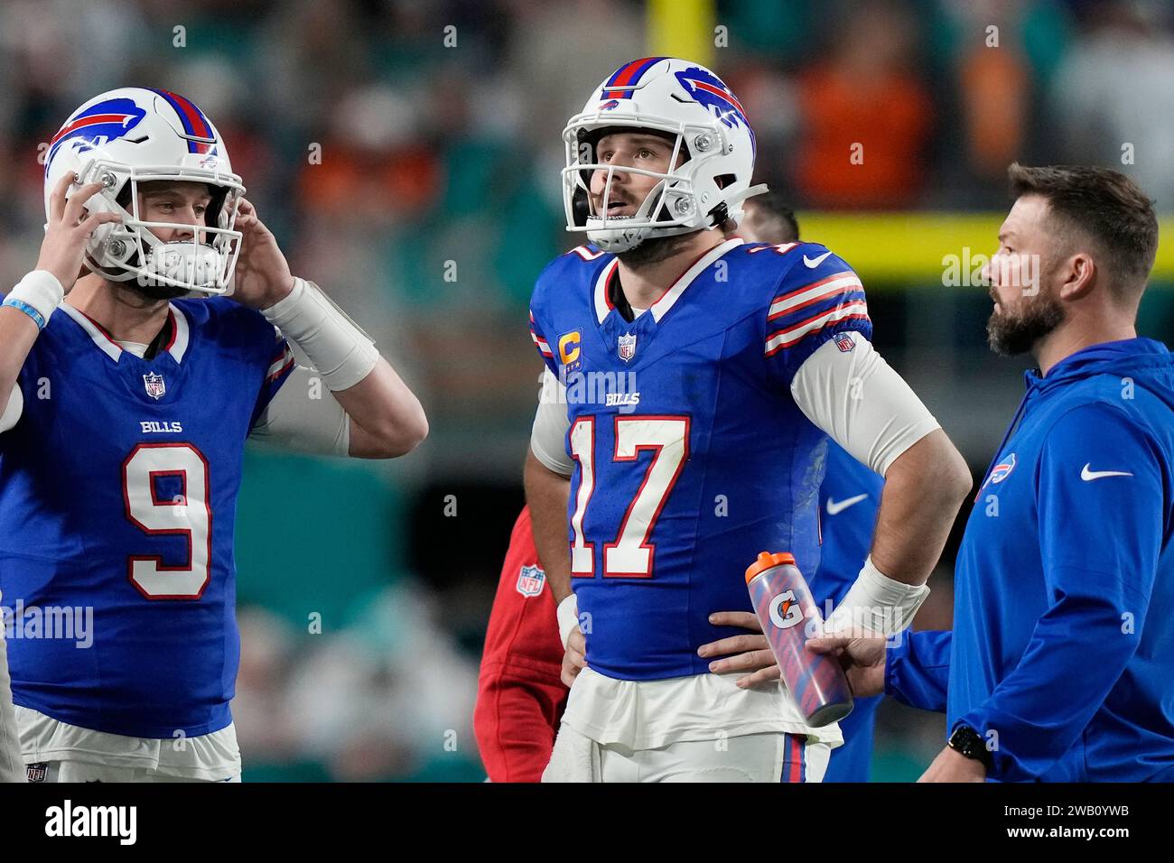 Buffalo Bills quarterback Josh Allen (17) looks up during a time out in ...