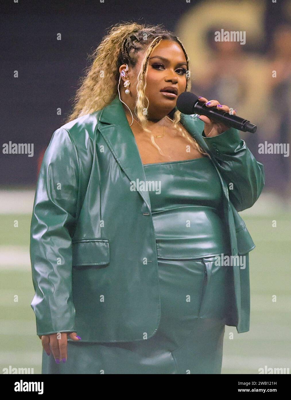 New Orleans, USA. 07th Jan, 2024. Samyra Cambrielle sings the National ...