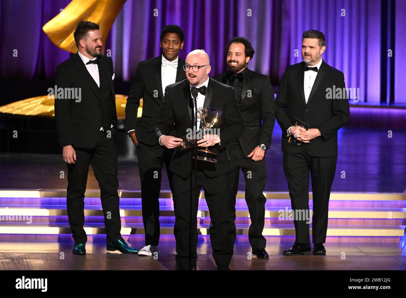 The team from "Welcome To Wrexham - Do or Die" accepts the Emmy for ...