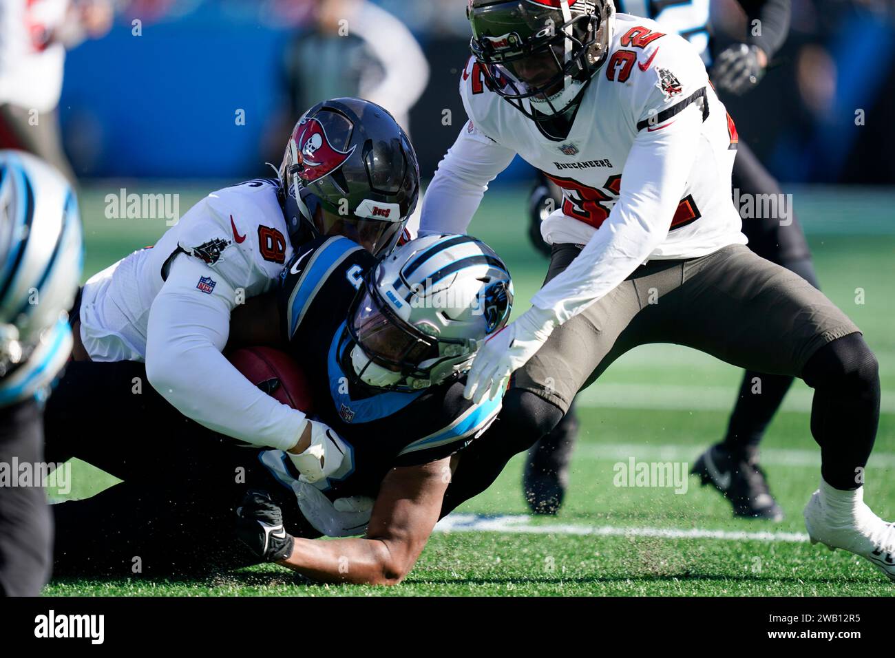 Tampa Bay Buccaneers linebacker SirVocea Dennis (8), left, and safety ...