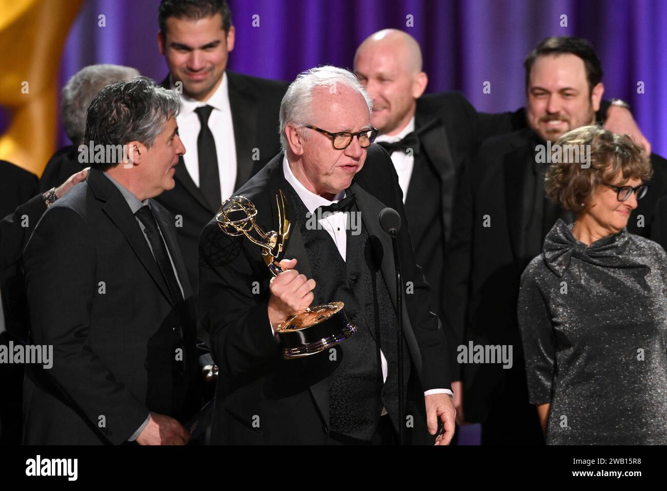 The team from "Elton John Live: Farewell From Dodger Stadium" accepts the Emmy for outstanding ...