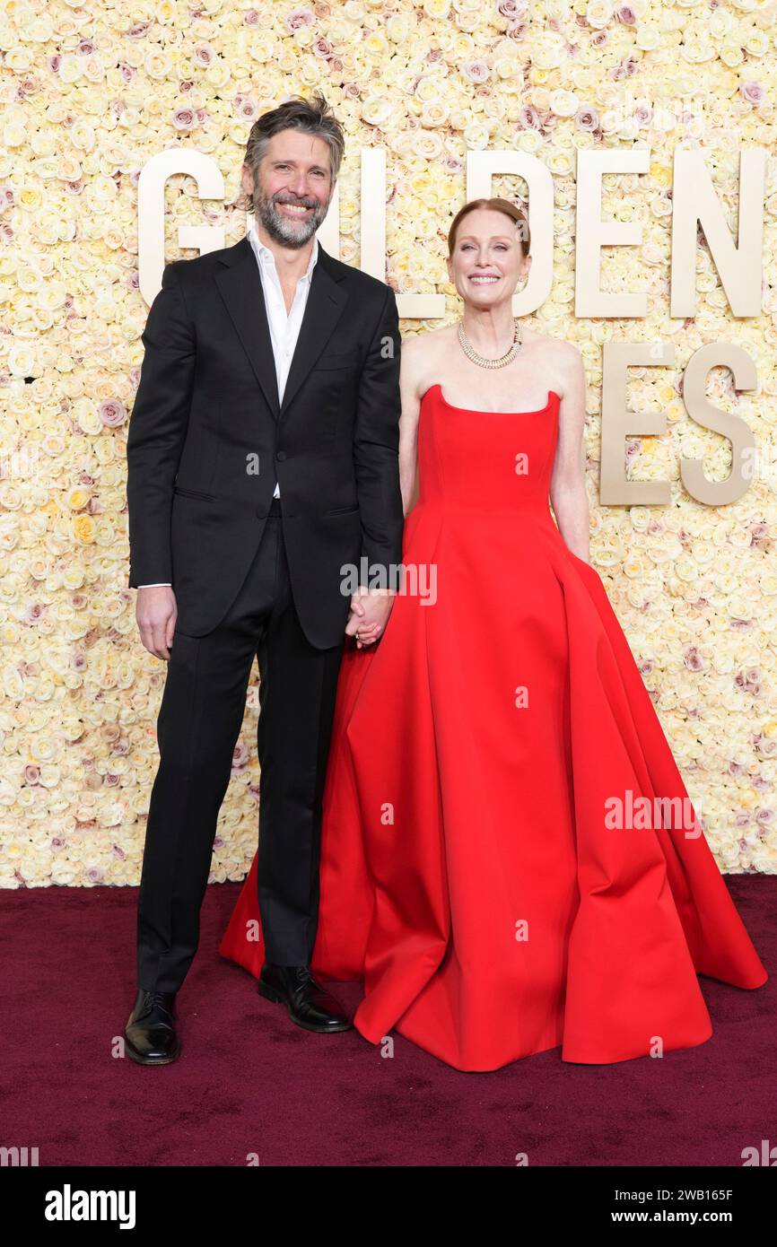 Bart Freundlich, left, and Julianne Moore arrive at the 81st Golden ...