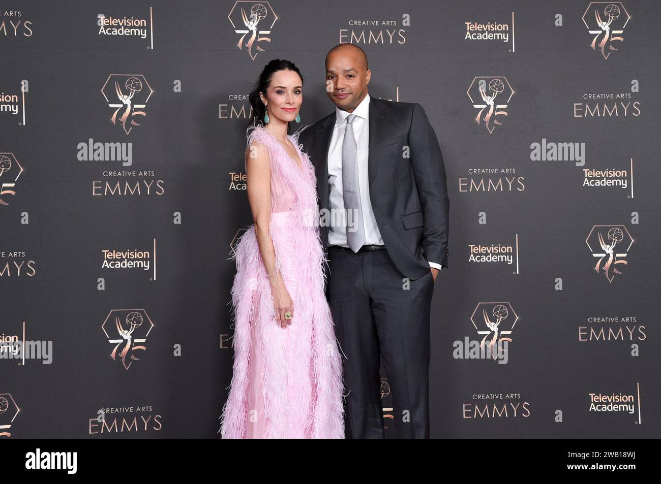 Abigail Spencer, left, and Donald Faison pose in the press room during ...