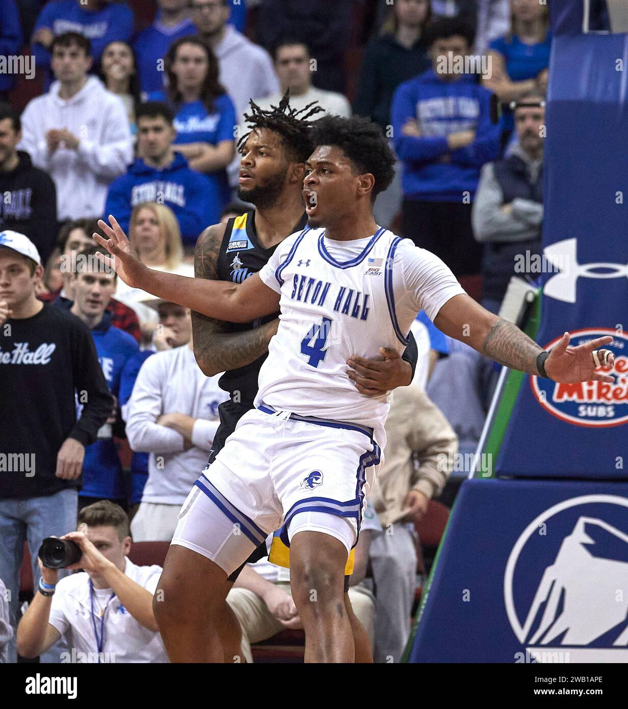 Seton Hall Pirates center Elijah Hutchins-Everett (4) tries to get low ...