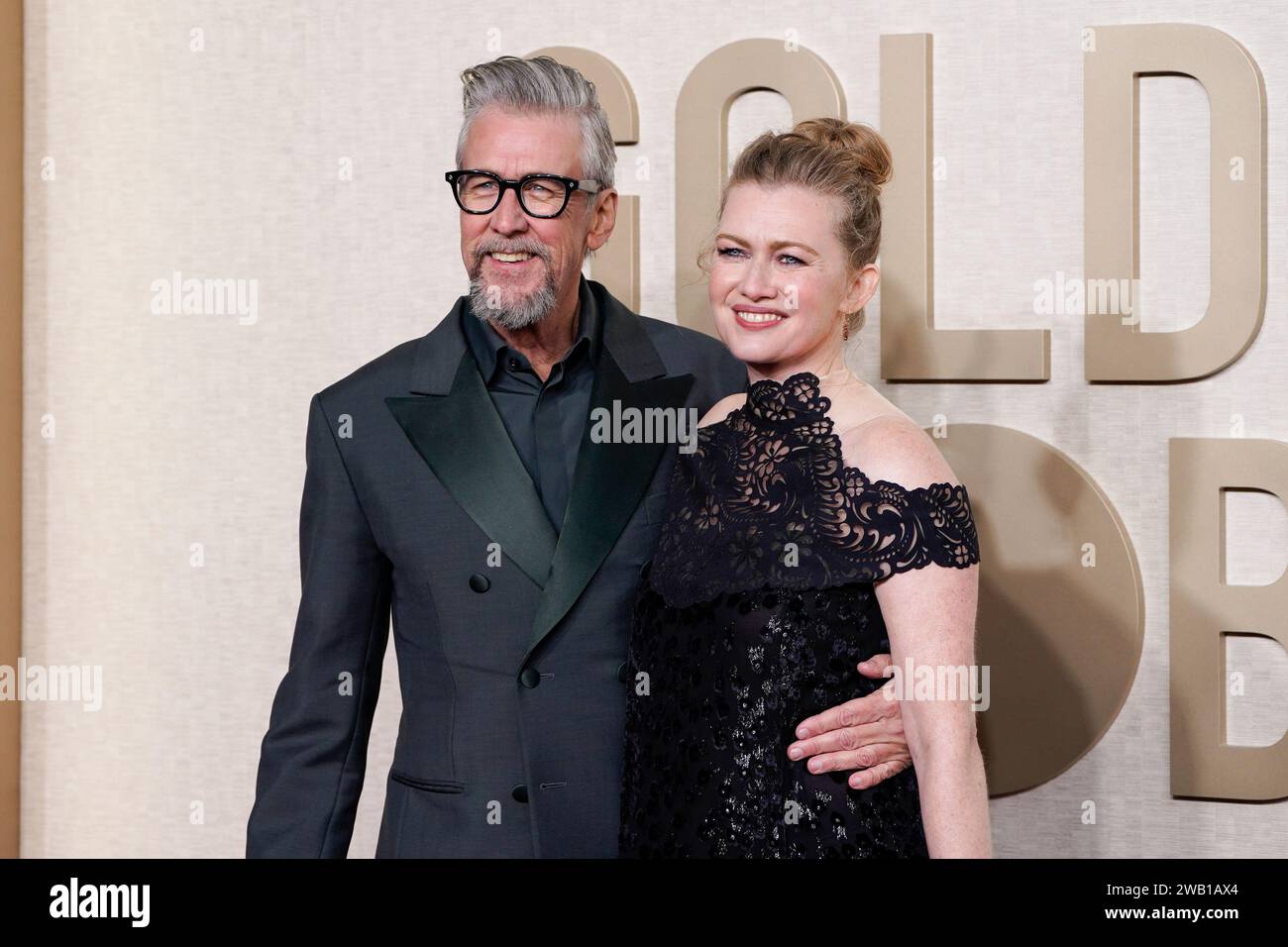 Alan Ruck, left, and Mireille Enos arrive at the 81st Golden Globe ...