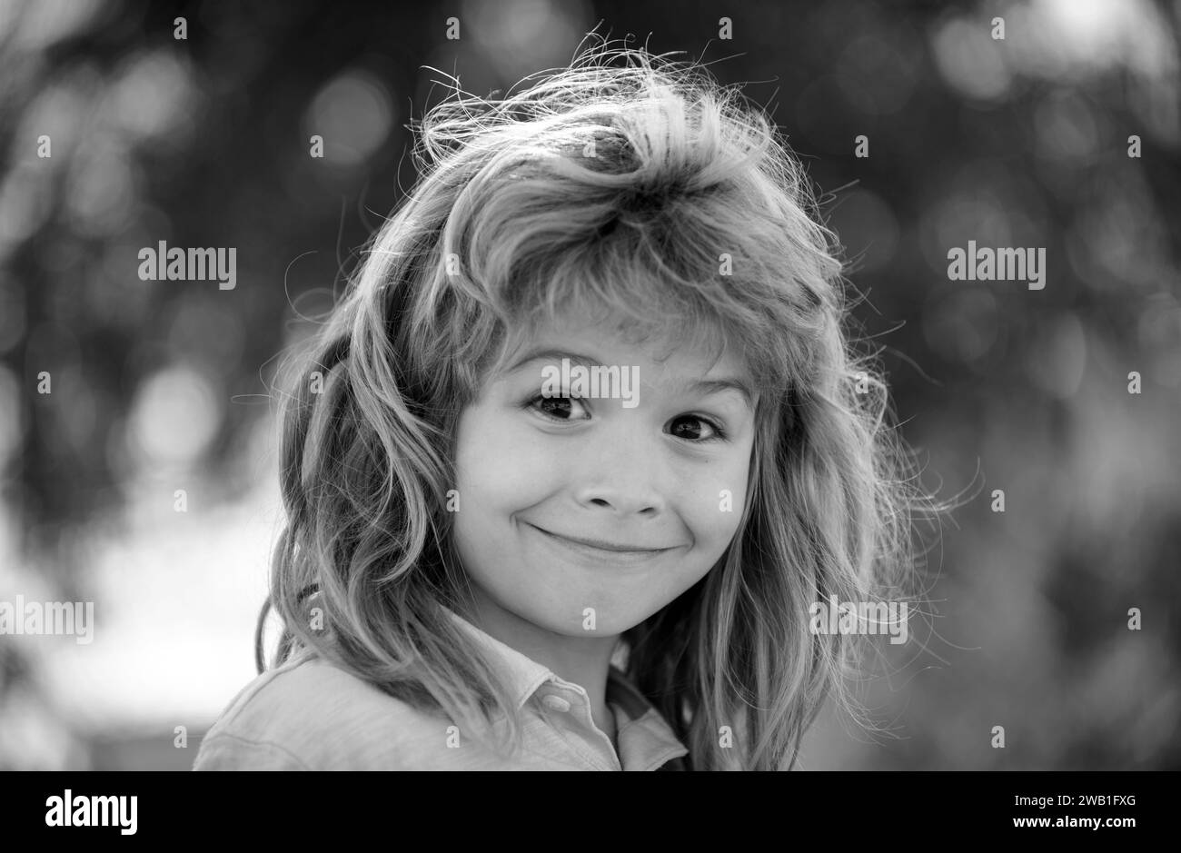 Face of cute smiling spring child. Kid emotions concept. Portrait of ...
