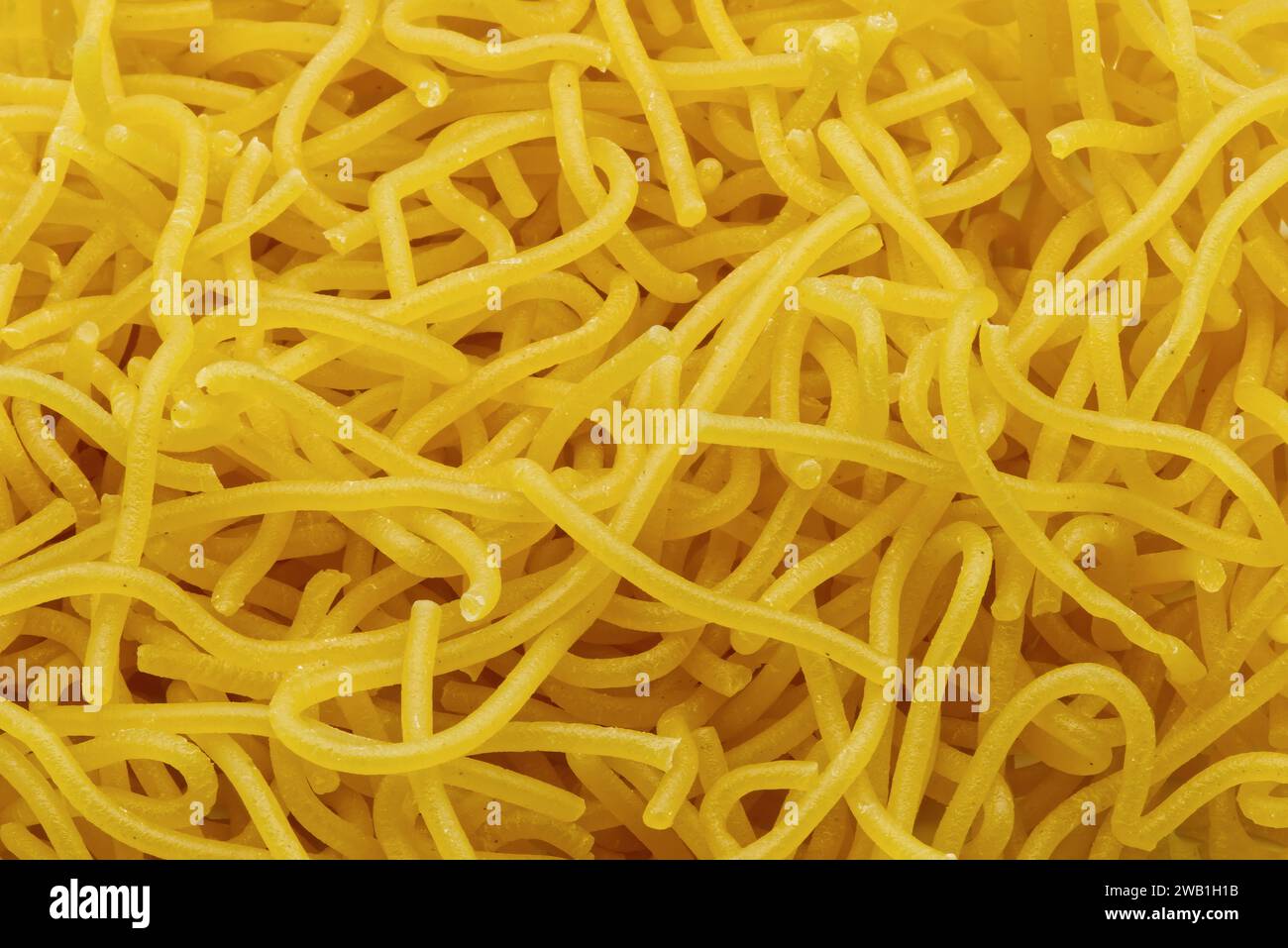 Tonnarelli pasta close-up. Bronze drawn fresh egg Italian pasta ...