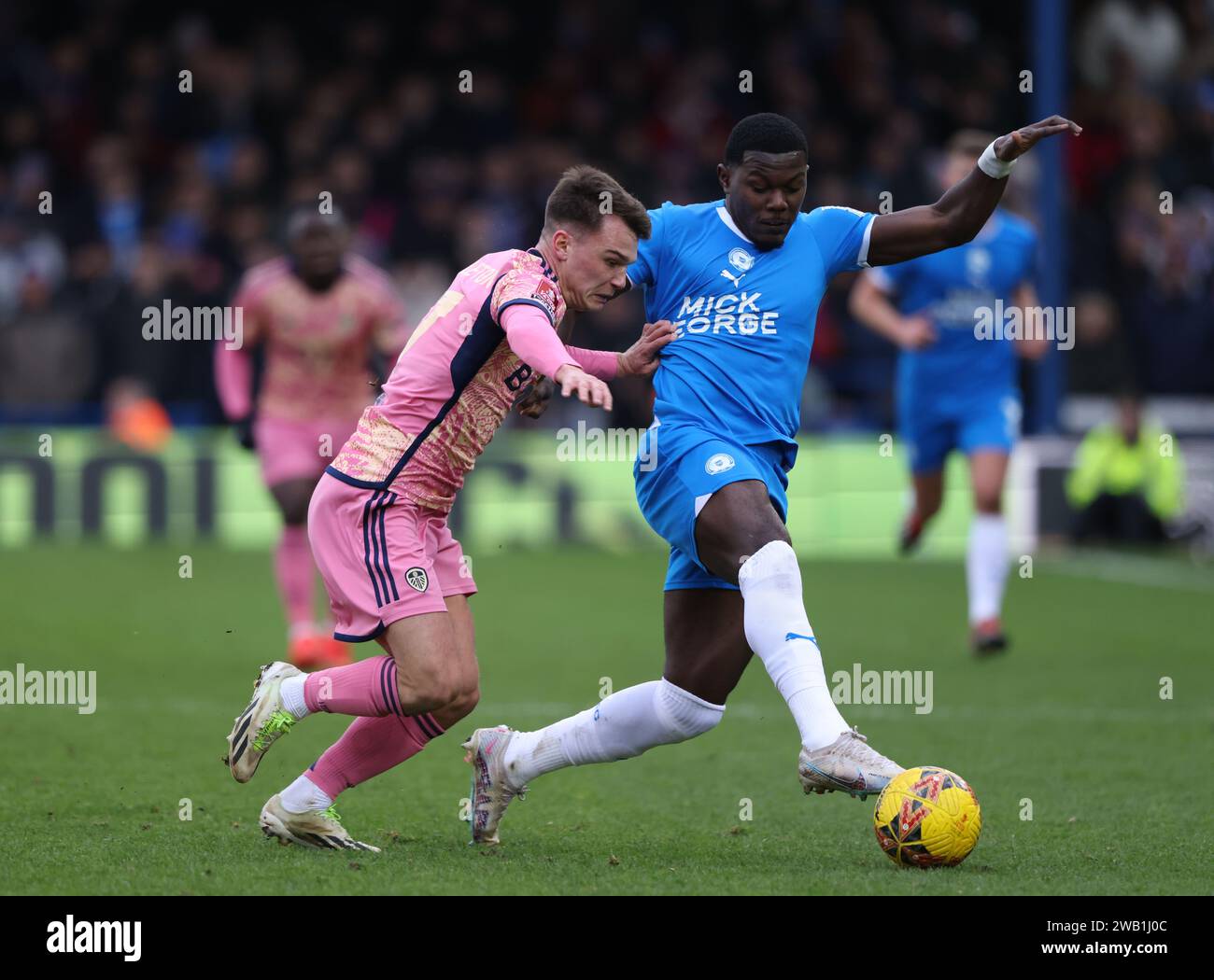 Peterborough, UK. 07th Jan, 2024. Jamie Shackleton (LU) Ephron Mason ...