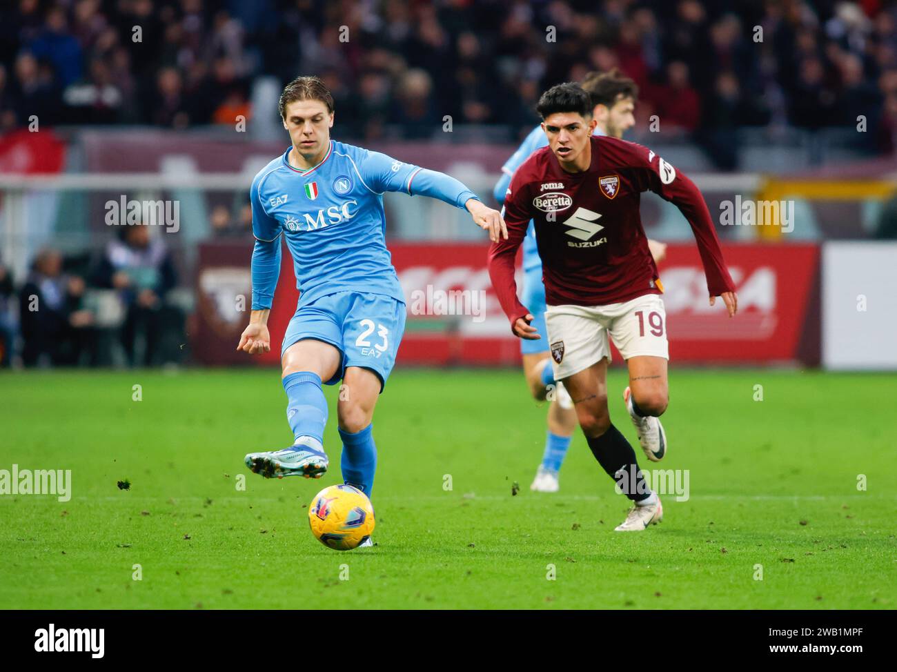 Torino, Italy. 07th Jan, 2024. Alessio Zerbin of Sac Napoli (L) Raul ...