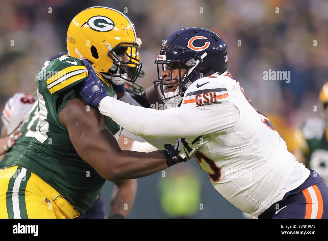 Green Bay Packers offensive tackle Luke Tenuta (78) and Chicago Bears ...