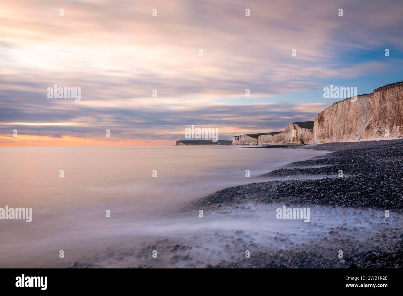 January sunset high tide at Birling gap and the seven sisters cliffs on ...