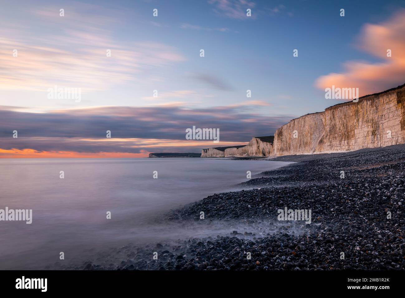 January sunset high tide at Birling gap and the seven sisters cliffs on ...