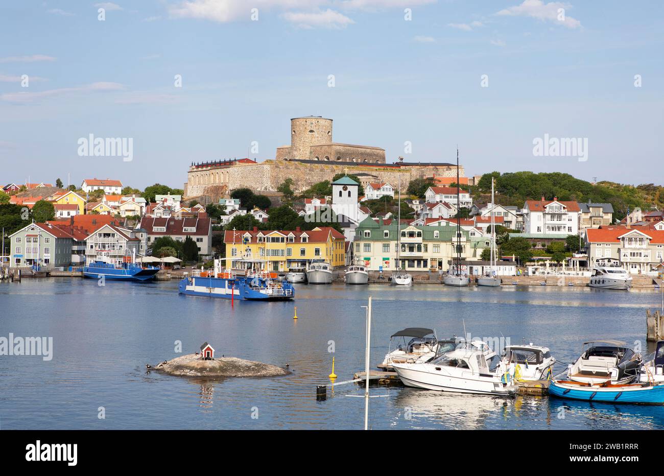 Ferry in the harbour of the archipelago island Marstrandsoe, behind the ...