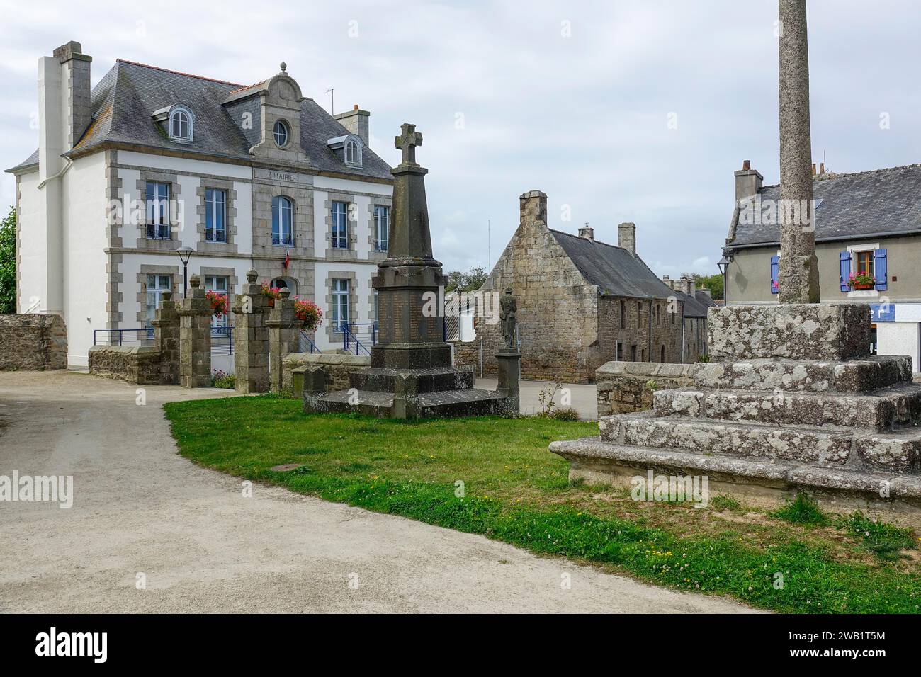 Town hall square with town hall and memorial to the fallen, Plouneour ...