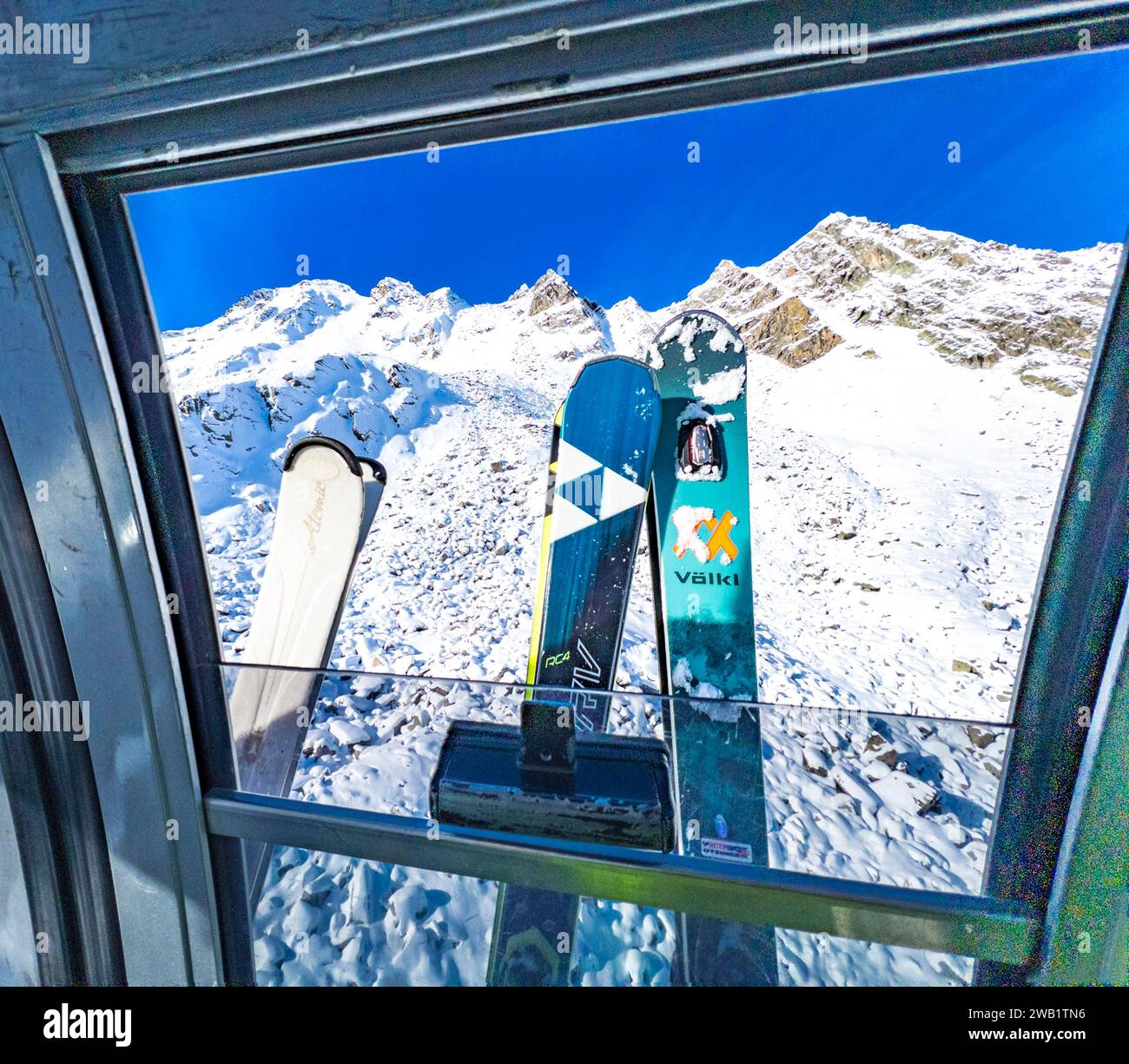 View through a gondola window of the Schwarze Schneid cable car onto ...