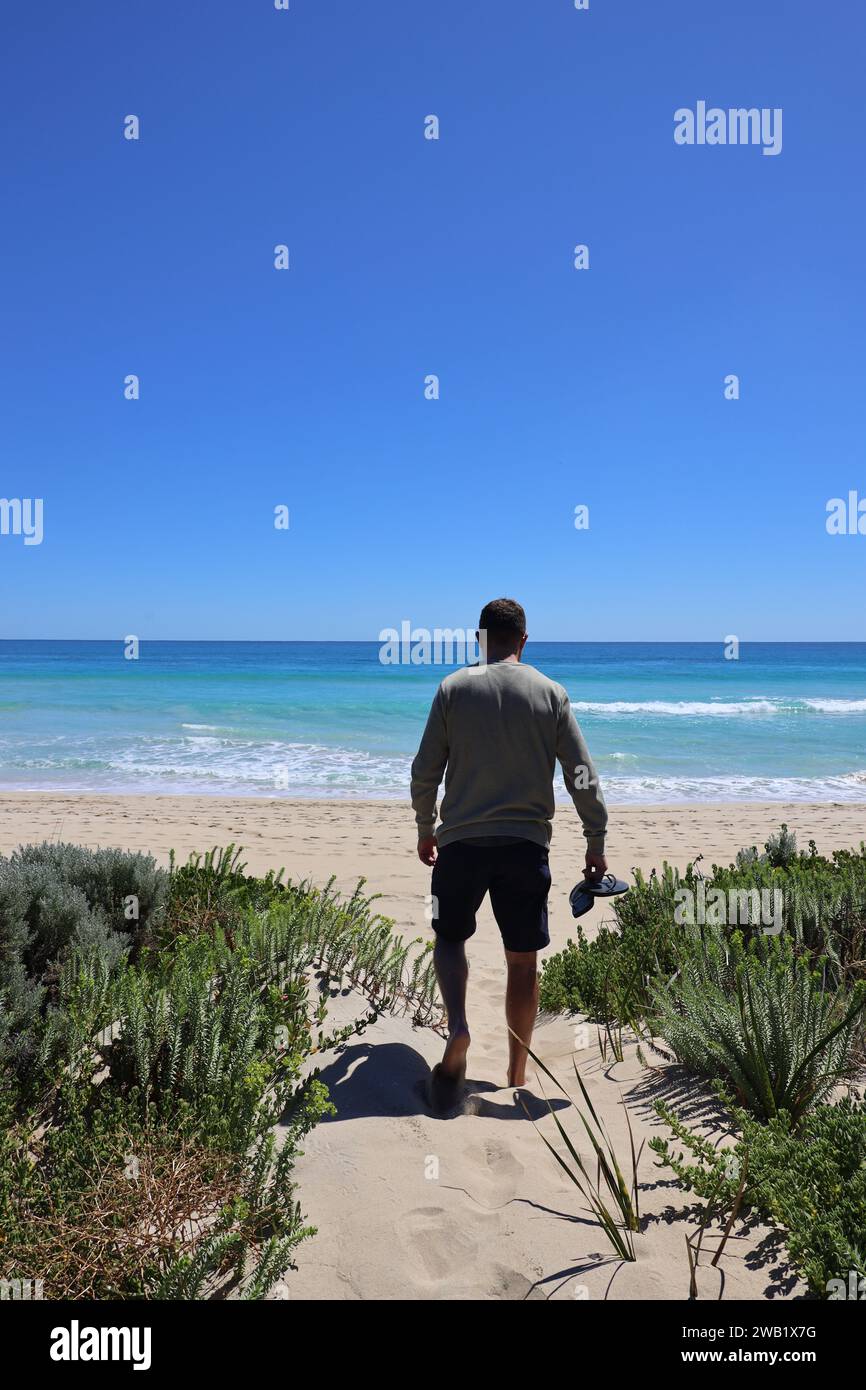 Man walking through rocks hi-res stock photography and images - Alamy