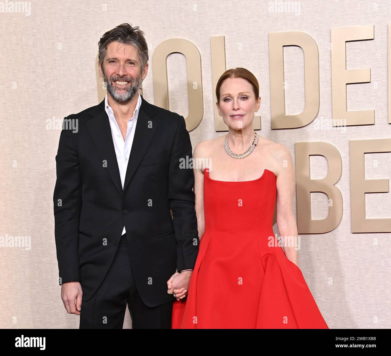 Beverly Hills, USA. 07th Jan, 2024. Julianne Moore and Bart Freundlich arriving at the 81st ...