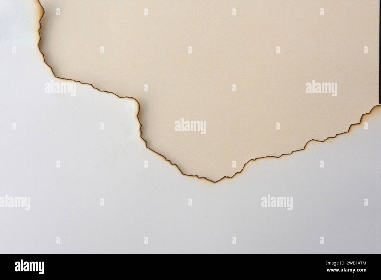 white burnt paper with cream background Stock Photo - Alamy
