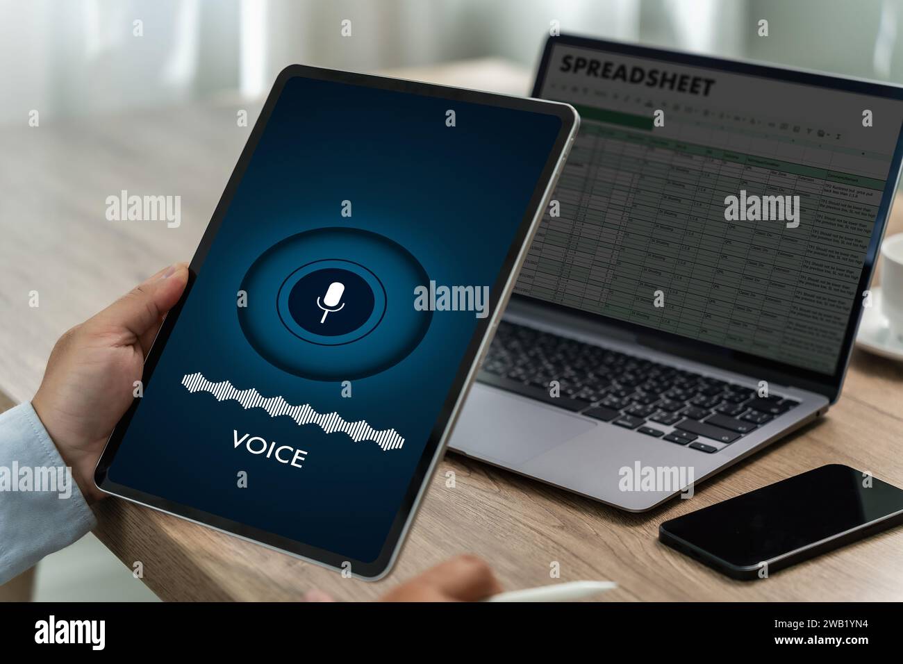 A voice recording man holding his smartphone screen generates AI ...