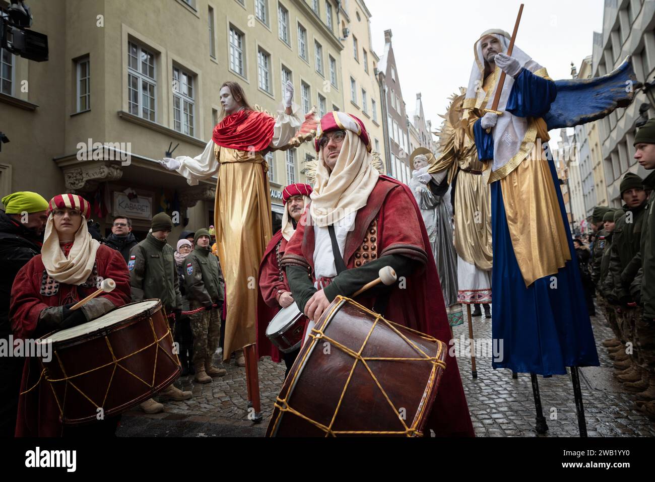 Participants taking part in the Procession of the Three Kings await the ...