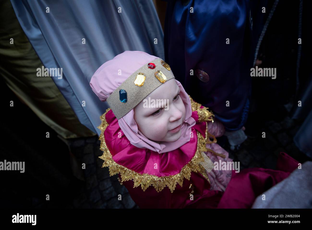 A girl dressed in period costume takes part in the Three Kings Festival ...