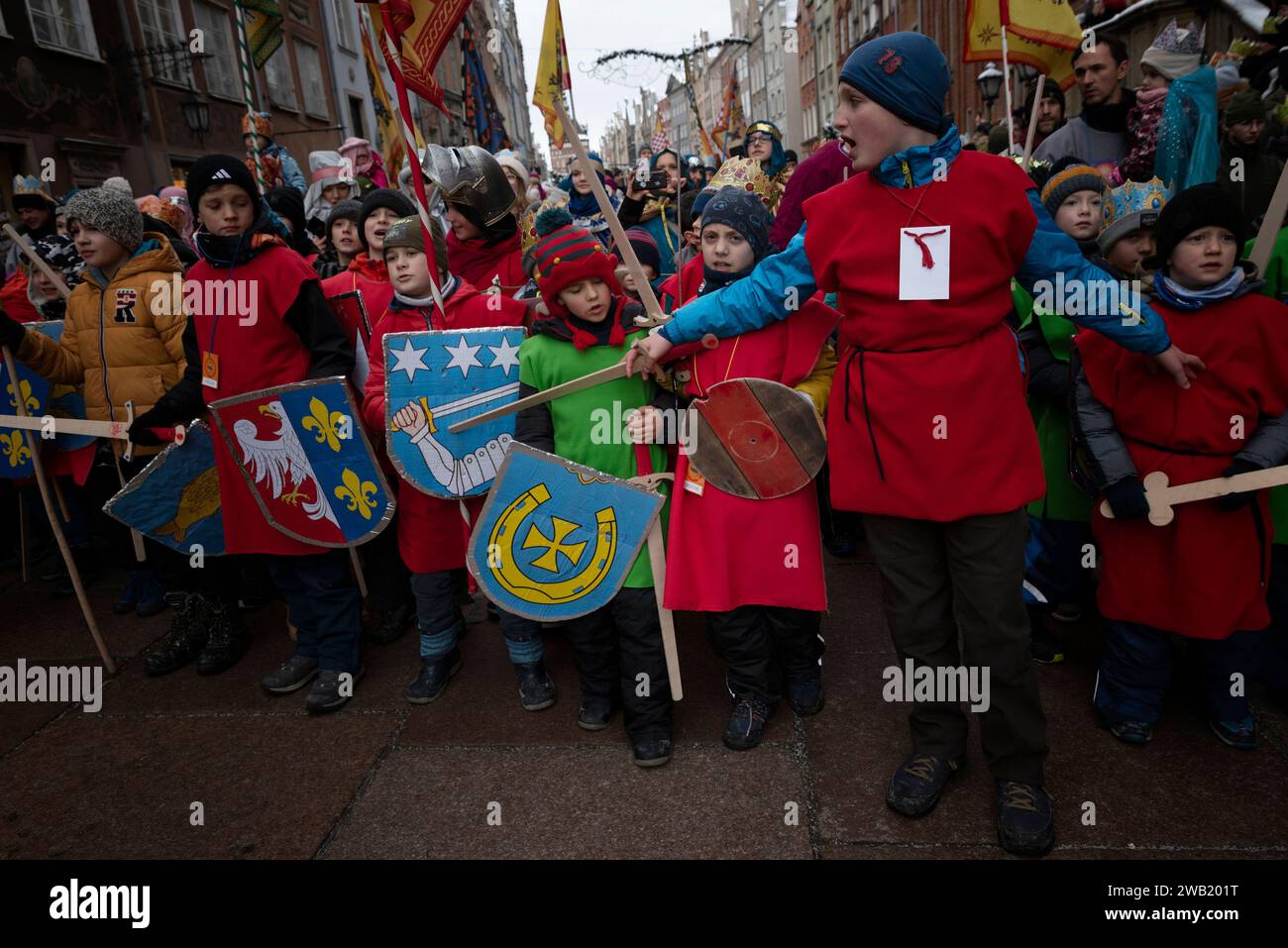 Children from schools and kindergartens dressed in period costumes take ...