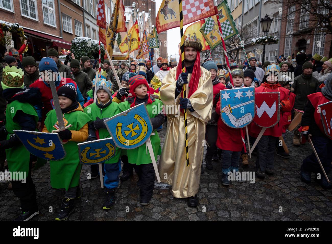 Children from schools and kindergartens dressed in period costumes take ...