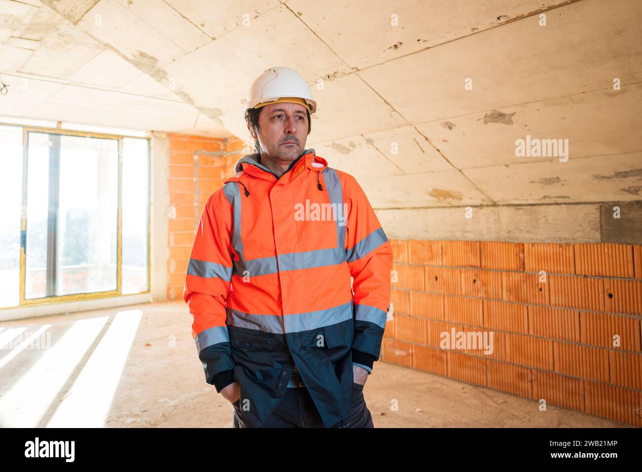 Portrait of construction engineer and building contractor on site ...