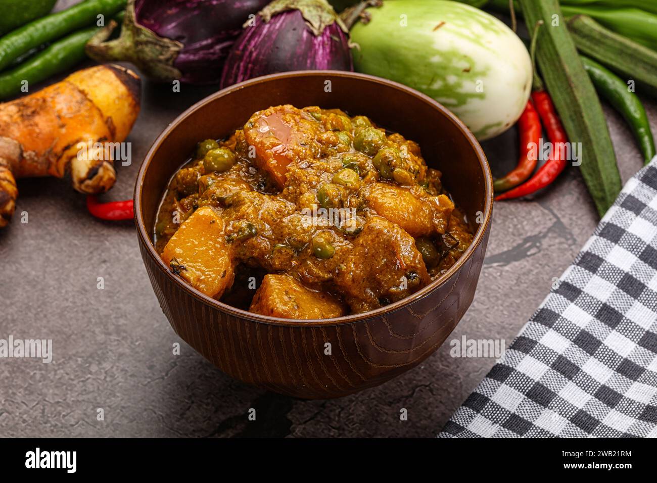 Indian traditional cuisine Aloo mutter - potato with green peas Stock ...