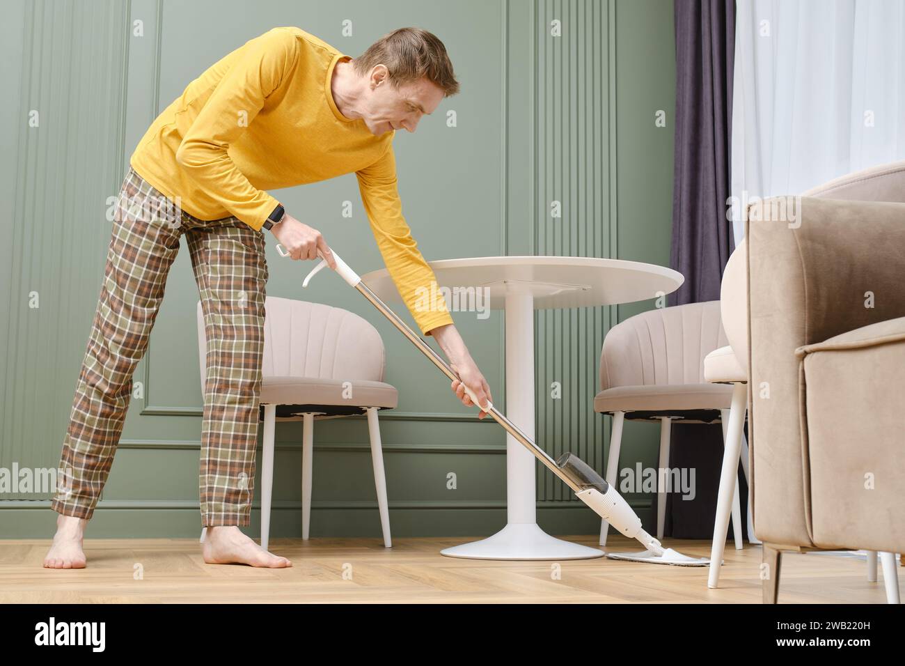 Mopping floor hi-res stock photography and images - Alamy