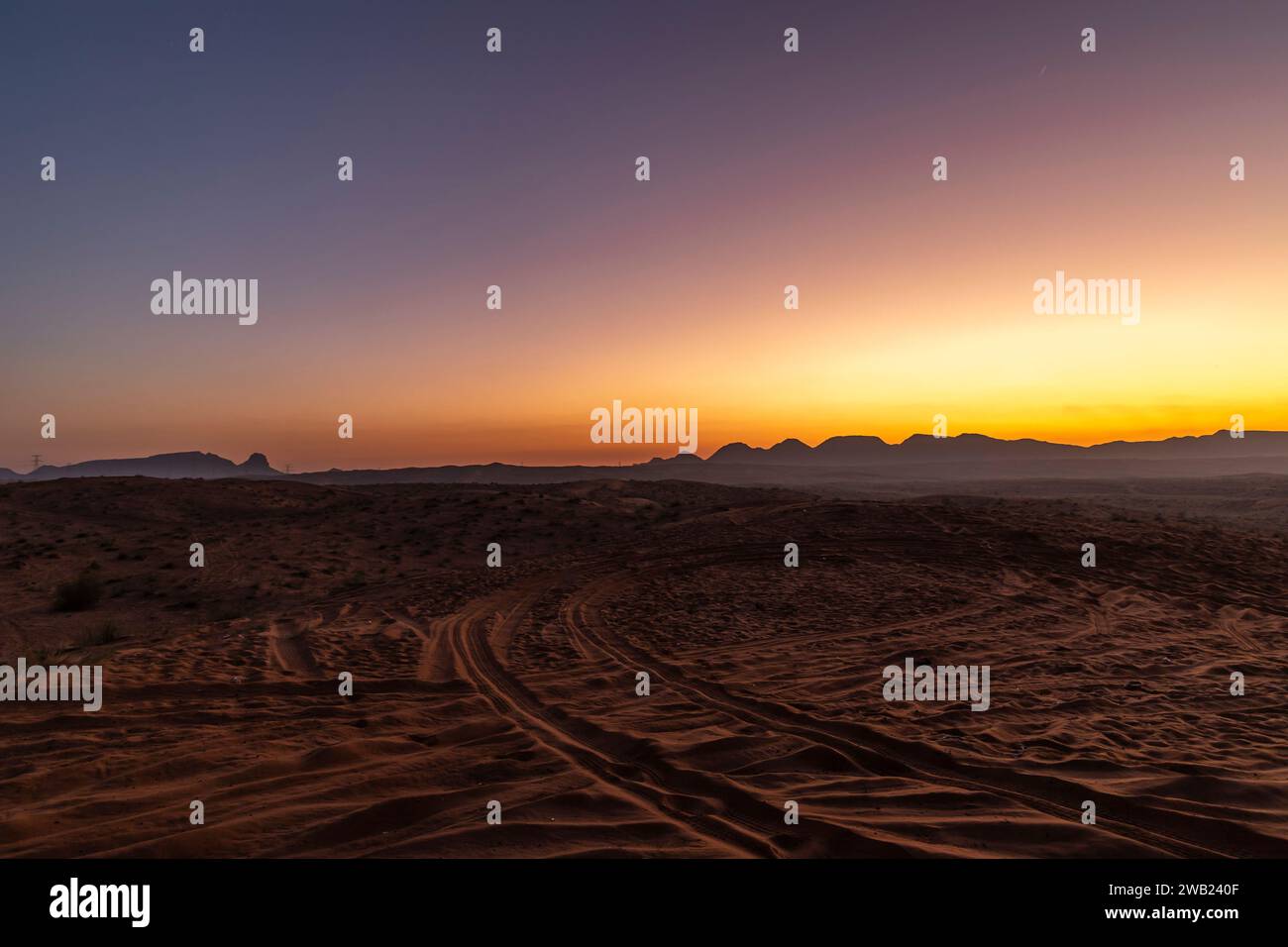Breathtaking view of golden hour sunrise from Dubai Maleha desert with ...