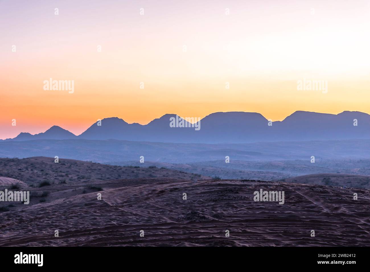 Breathtaking view of golden hour sunrise from Dubai Maleha desert with ...