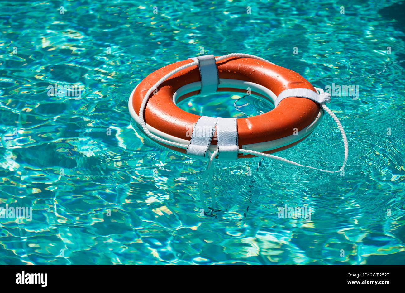 Help and drowning concept. Life saver ring floating in the water Stock ...