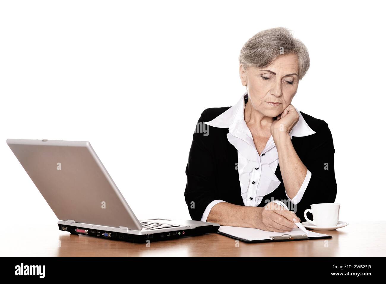 old woman working with laptop on white background Stock Photo - Alamy