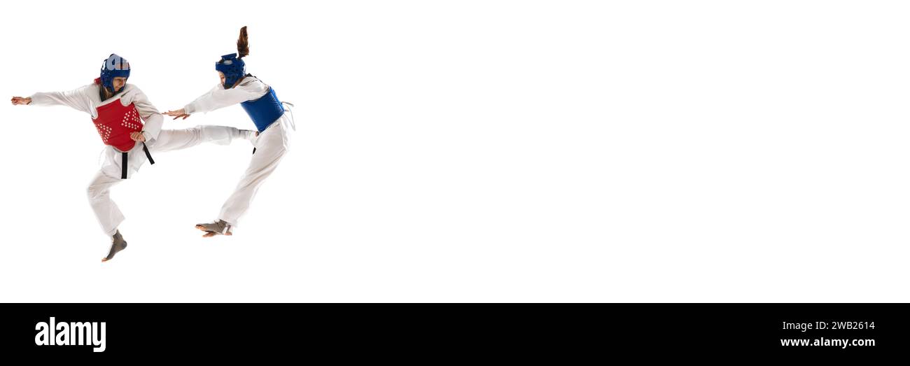 Leg powerful kick. Young girls training, practicing taekwondo stunts ...