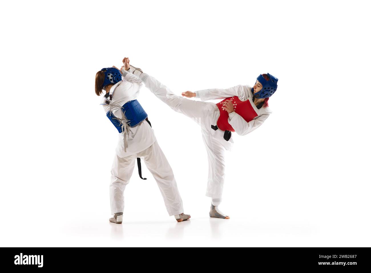 Kick and protection stunts. Young girls, taekwondo athletes in motion ...