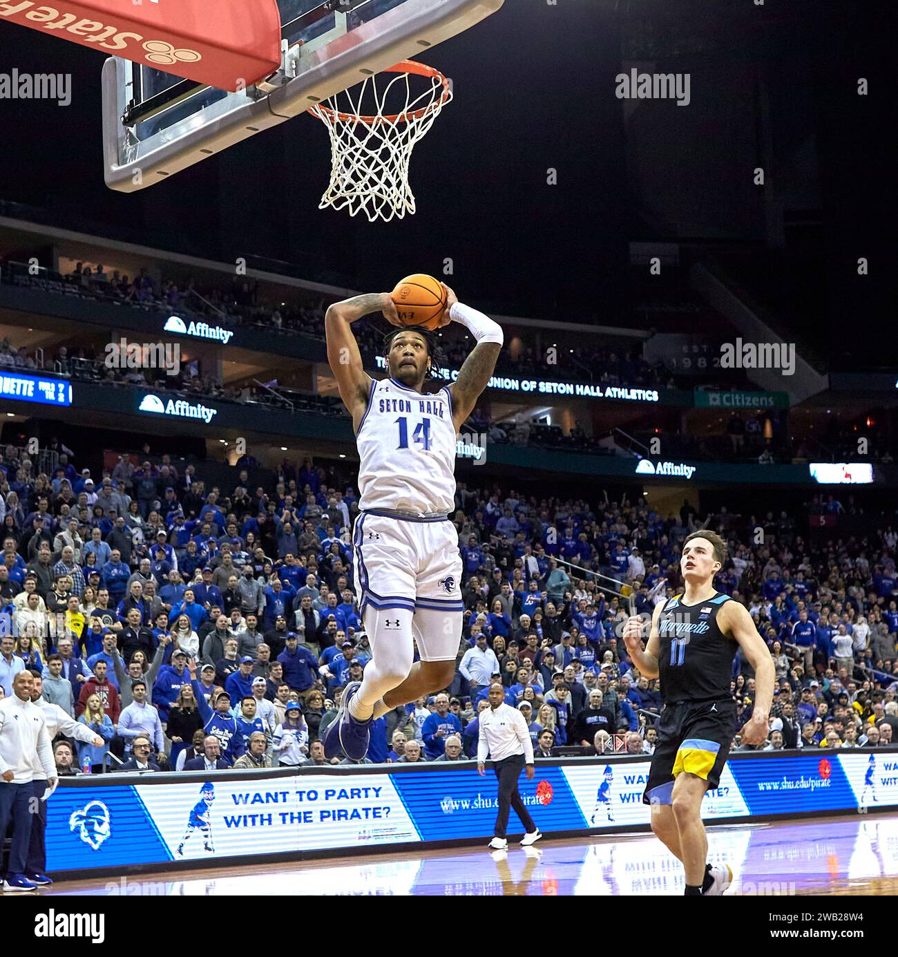 Seton Hall Pirates guard Dre Davis (14) dunks in the second half ...