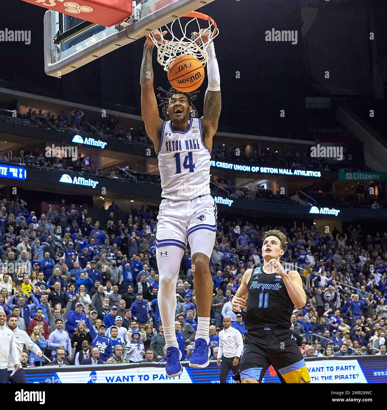 Seton Hall Pirates guard Dre Davis (14) dunks in the second half ...