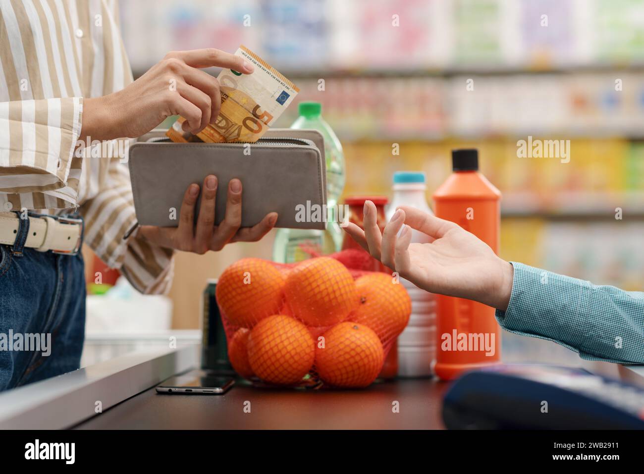 Paying cash groceries store close up hi-res stock photography and ...