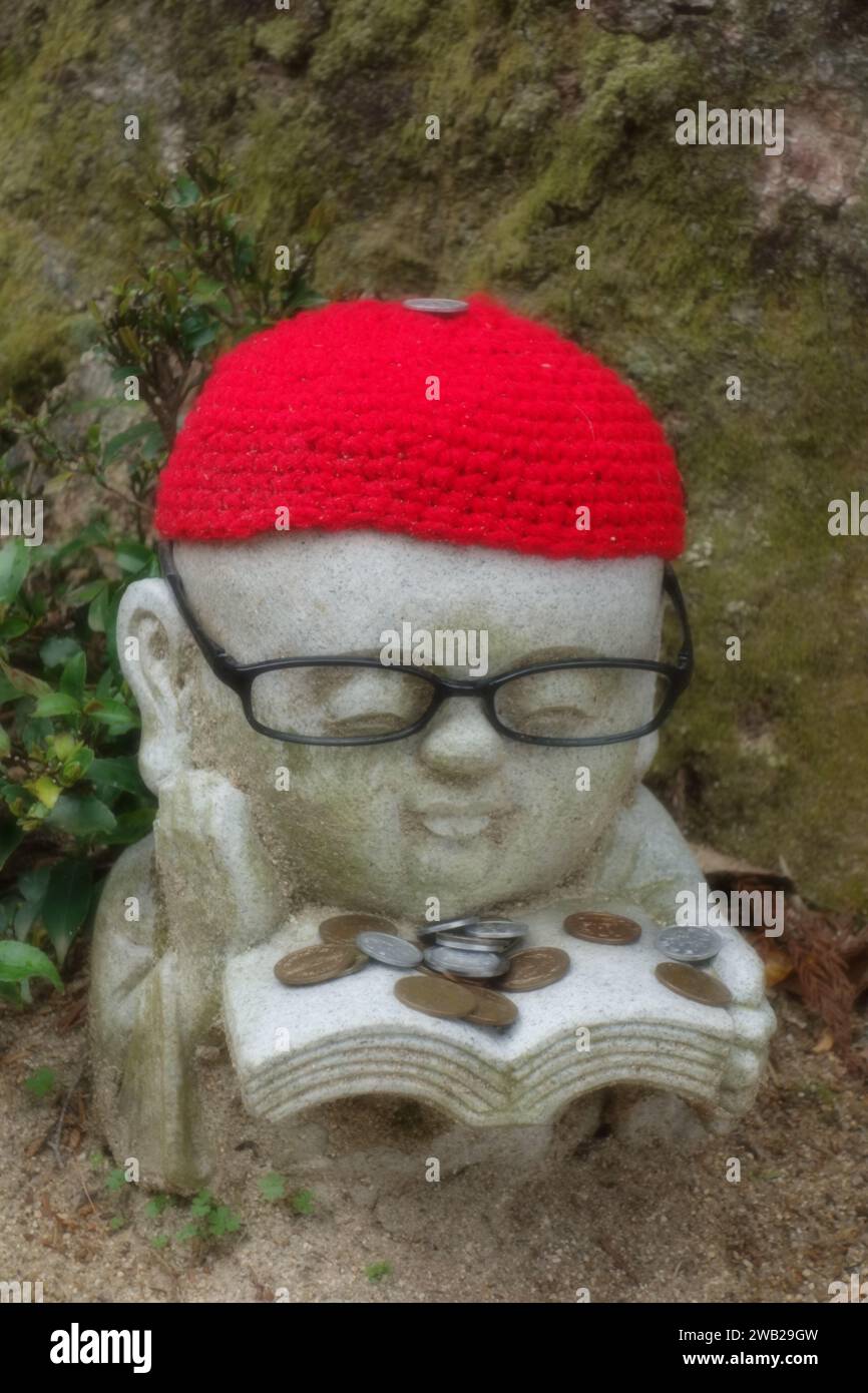 Statues in memory of unborn children on the island of Miyajima, near ...