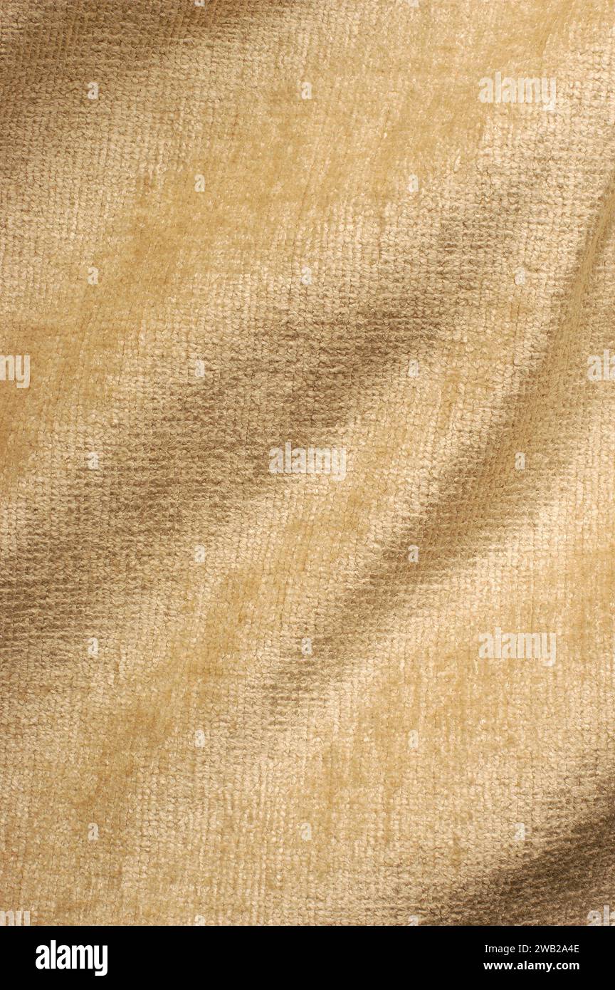 A vertical of a beige woven wavy fabric background Stock Photo - Alamy