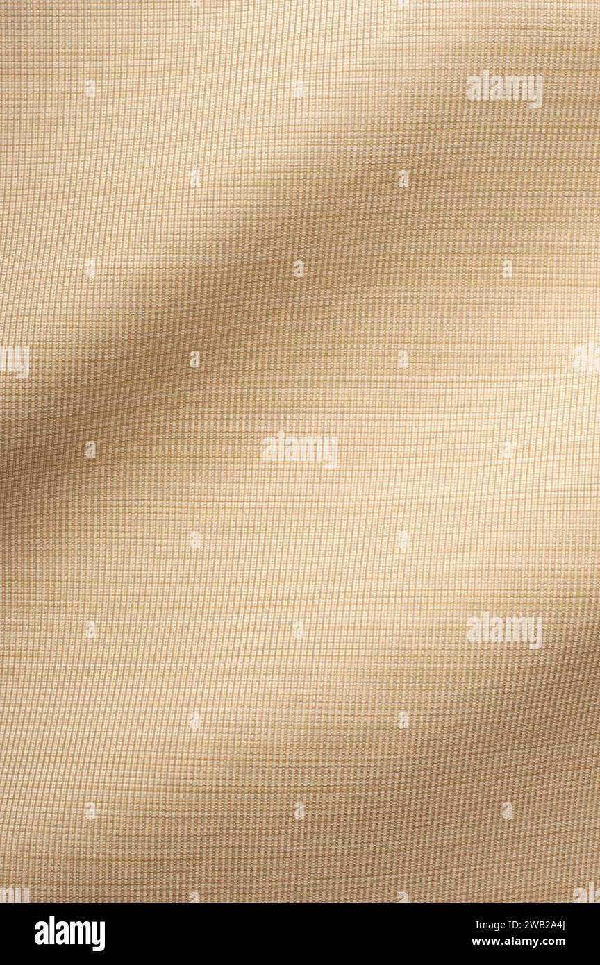 A vertical of a beige woven wavy fabric background Stock Photo - Alamy