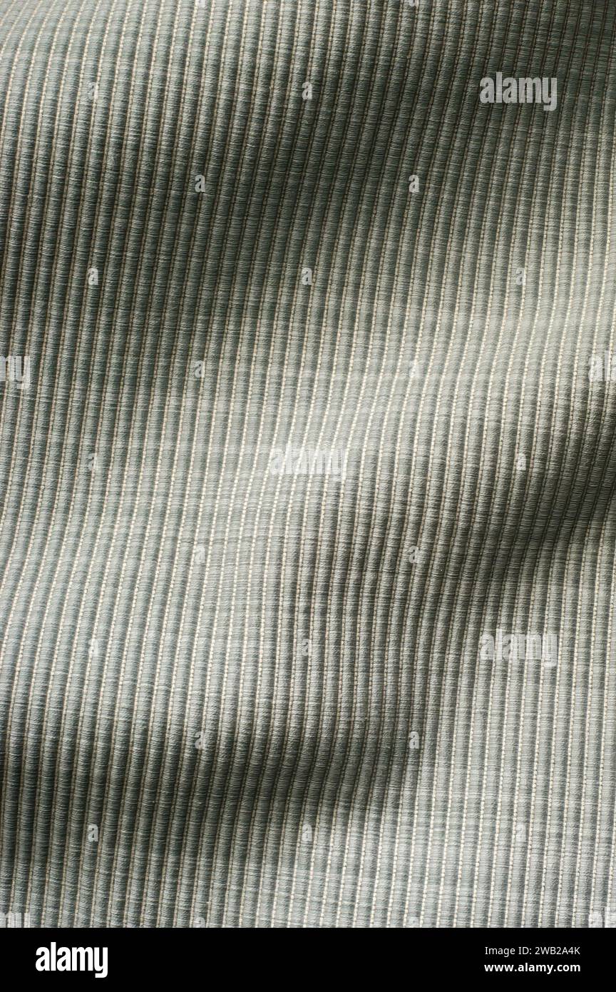 A vertical of a gray woven wavy fabric background Stock Photo - Alamy
