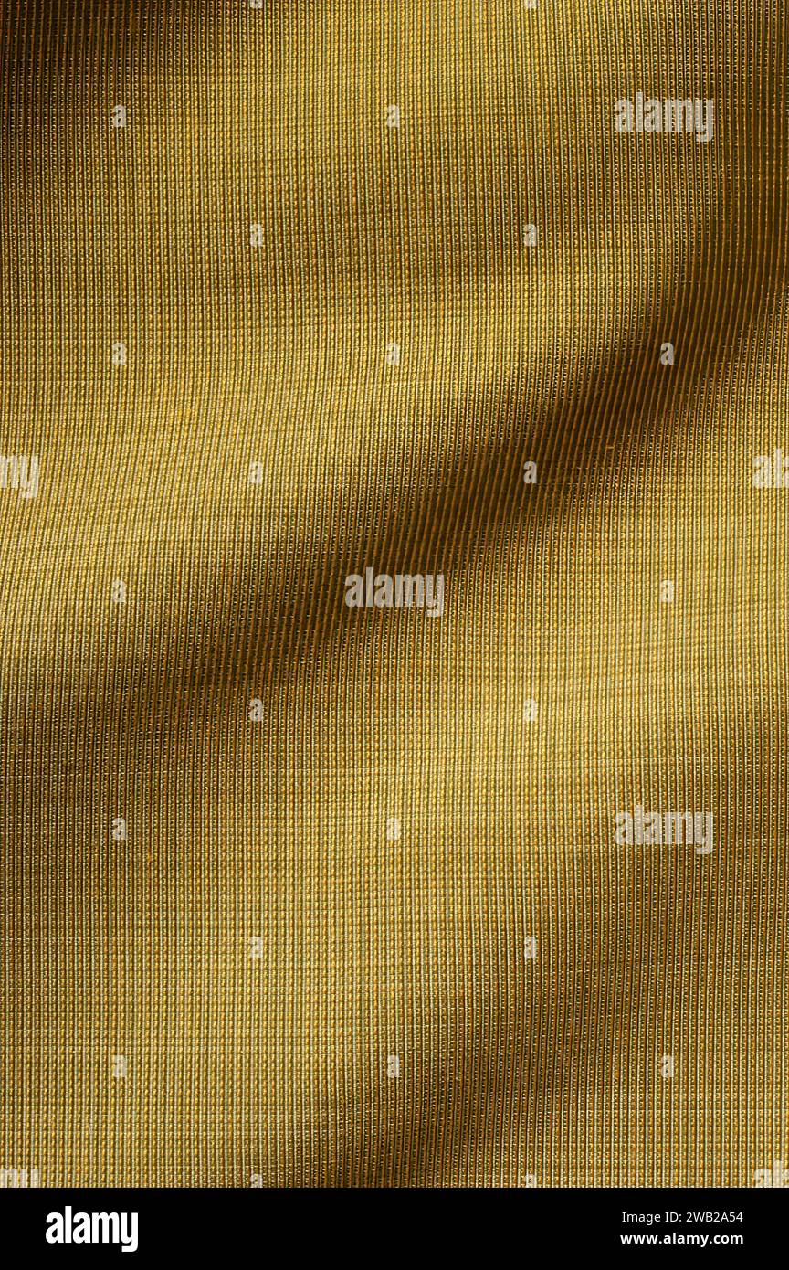 A vertical of a brown woven wavy fabric background Stock Photo - Alamy